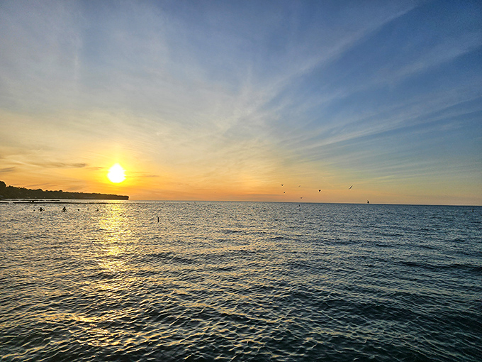 Golden hour magic: when Lake Erie dresses up in evening colors, even smartphone photographers look like they know what they're doing.