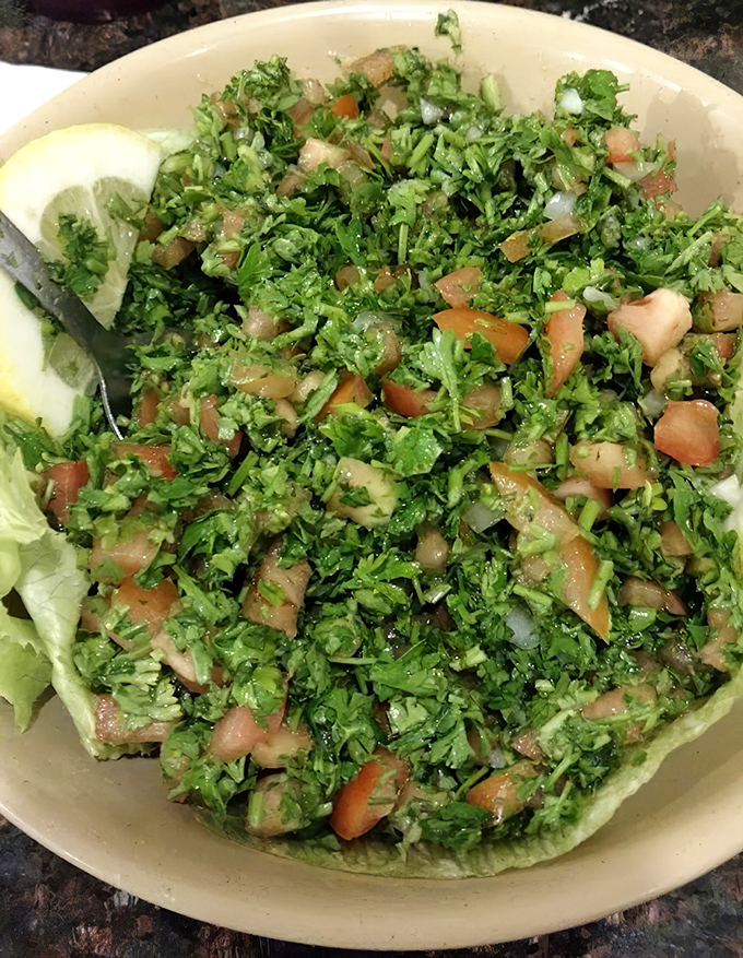 This tabbouleh isn't just a salad—it's a vibrant, herby festival where parsley and tomato dance together in perfect Mediterranean harmony.