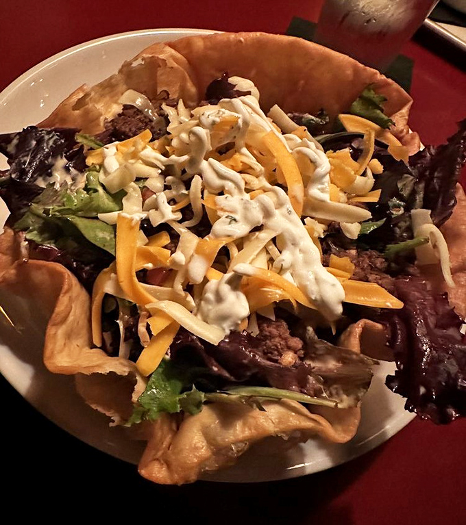 This taco salad bowl doesn't know the meaning of "modest portion"&mdash;it's a crunchy, cheese-topped celebration of Midwest generosity in edible form.