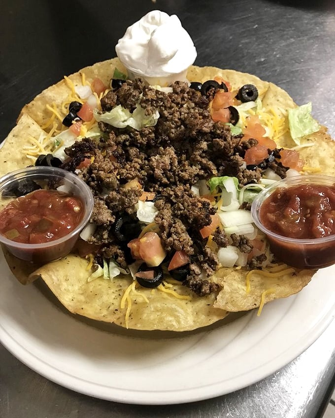 Taco salad that defies gravity and good sense&mdash;a mountain of seasoned beef, cheese, and veggies that makes vegetables feel like cheating. 