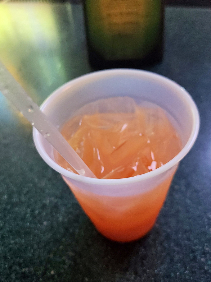 A Tequila Sunrise that looks like Wisconsin's summer sunset in a glass—simple, unpretentious, and exactly what you need after a long week.