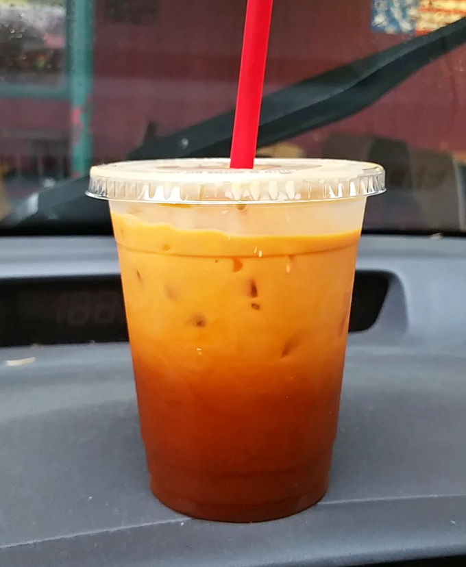 Thai iced tea that glows like a California sunset. The perfect sweet companion to cut through all that savory burger goodness.