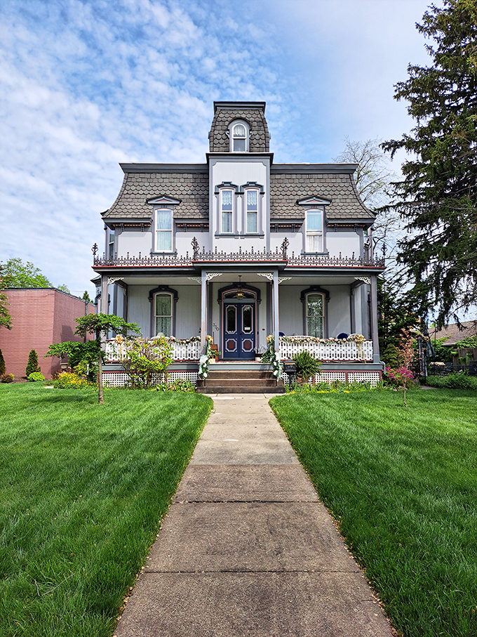 This Victorian beauty stands as testament to craftsmanship that refused to cut corners, its ornate details and welcoming porch practically whispering "come sit a spell."