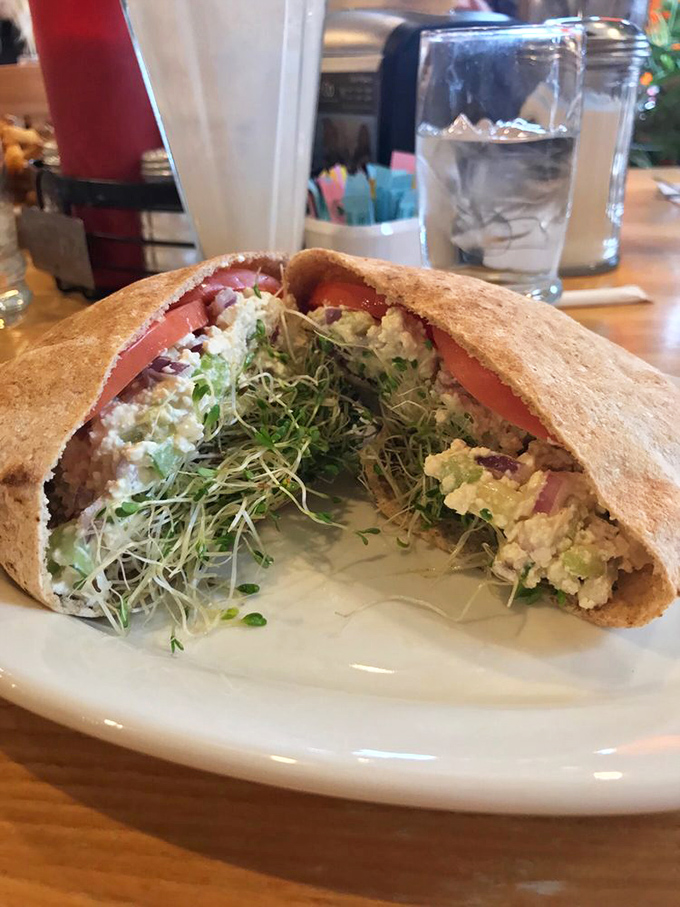 Pita perfection: a garden of sprouts and veggies tucked into a warm pocket. Proof that healthy eating doesn't have to feel like punishment.