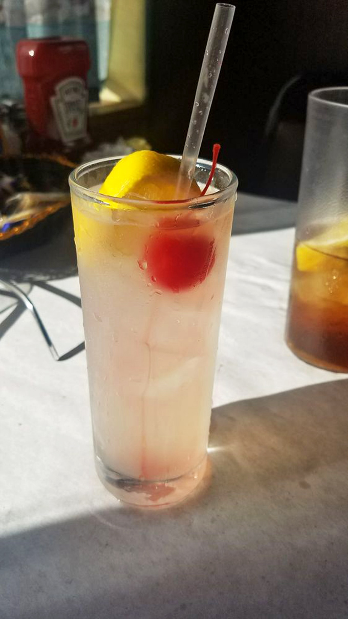 That's not just a Tom Collins&mdash;it's vacation in a glass, complete with the cherry and lemon that say "you deserve this moment."