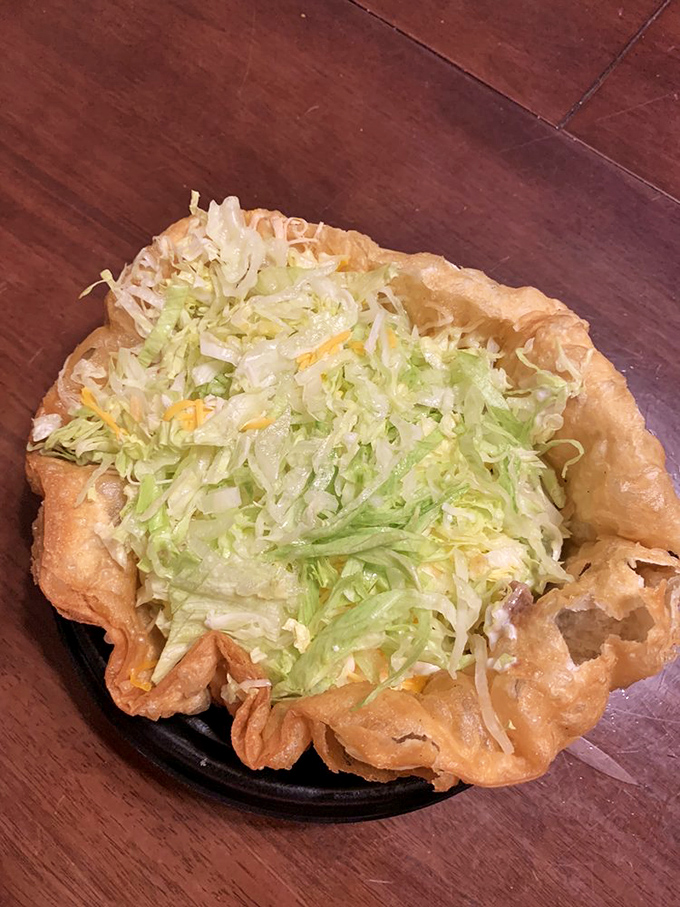 The tostada grande isn't messing around&mdash;a crispy foundation supporting a skyscraper of toppings that requires both strategy and appetite.