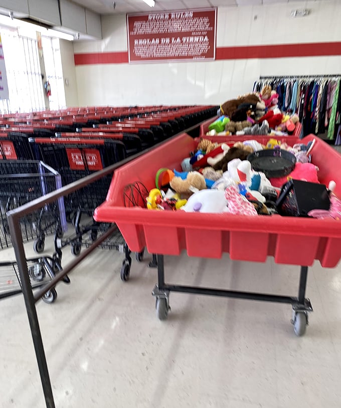 A bin of forgotten toys and treasures – one person's clutter transformed into another's nostalgic gold mine.