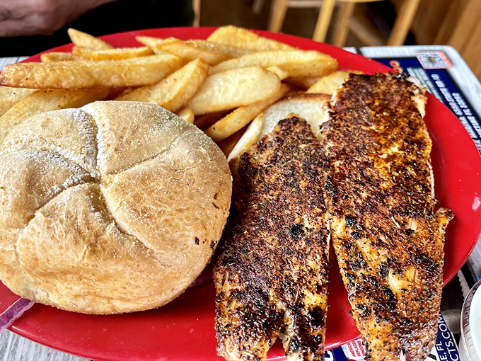 Blackened fish that's seen just enough heat to develop a personality, served with fries that clearly weren't an afterthought.