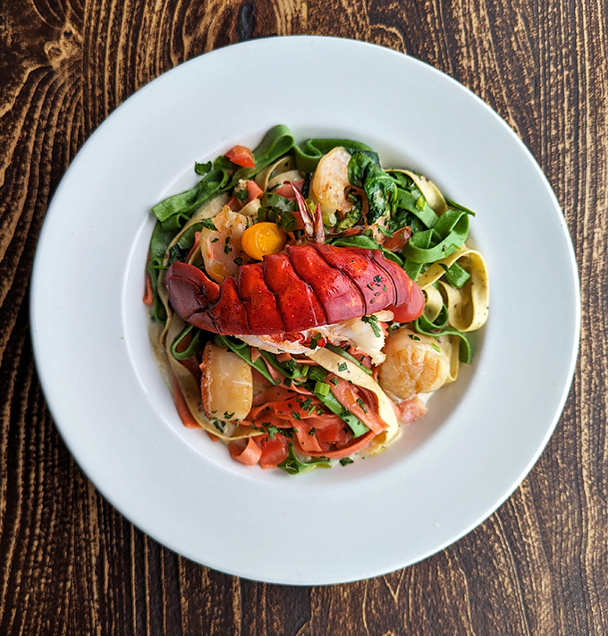 Lobster pasta that makes you wonder why we ever bothered putting seafood on anything else. Those colors aren't a dish&mdash;they're a celebration.
