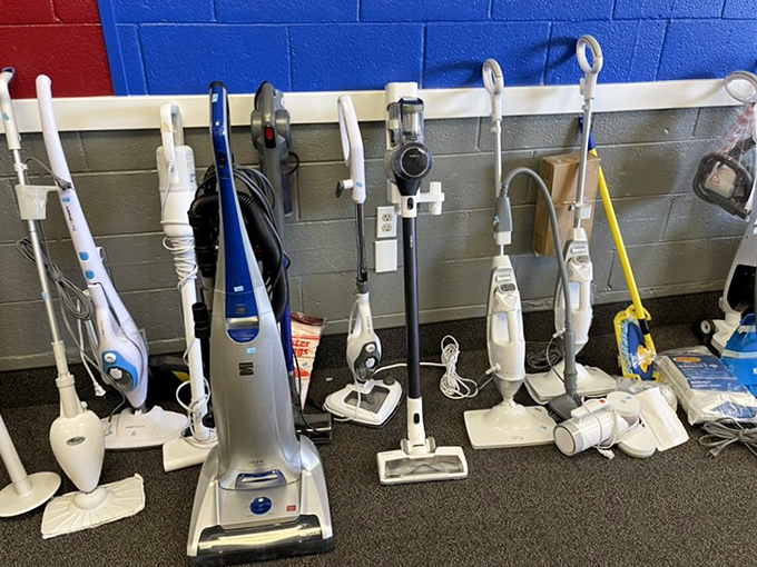 More vacuum cleaners than a cleaning supply convention, each one eager for dust bunny duty.