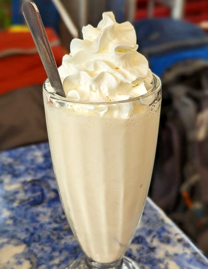 A vanilla milkshake thick enough to require Olympic-level straw strength. Worth the workout.