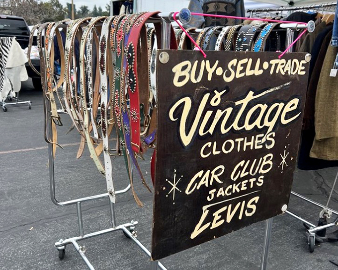 "Buy, Sell, Trade" proclaims this vintage clothing vendor, where leather belts and classic Levi's await their next adventure. 