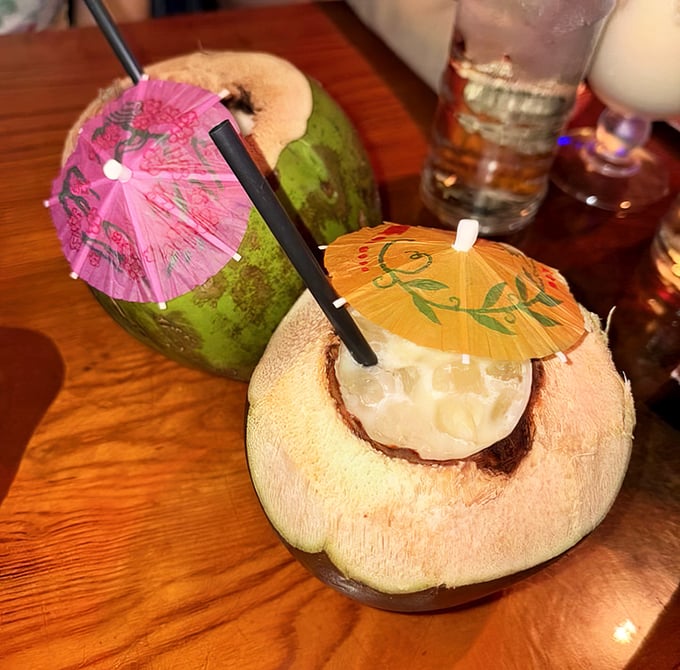 Coconut drinks served in their natural containers&mdash;nature's sippy cups! Complete with tiny umbrellas that say "vacation starts now."