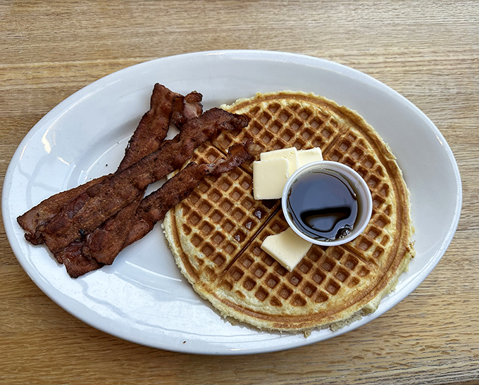 The waffle's perfect grid pattern isn't just for show&mdash;it's engineered to hold maximum butter and syrup for optimal breakfast bliss.