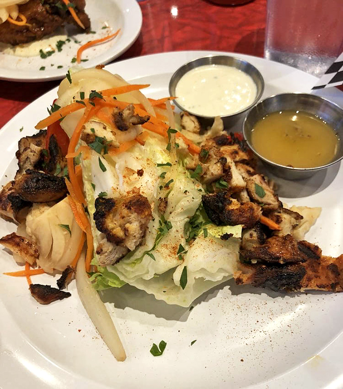 Proof that salads can hang with the cool kids. Grilled chicken and fresh veggies with those metal cups of dressing standing by like loyal sidekicks.