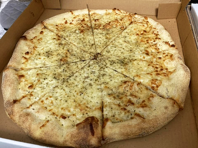 The white pie&mdash;garlic-kissed canvas of cheesy perfection. For those moments when tomato sauce feels like wearing a tuxedo to a backyard barbecue.