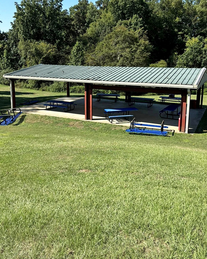 This simple pavilion has hosted more family reunions, community cookouts, and childhood memories than any fancy resort ever could.
