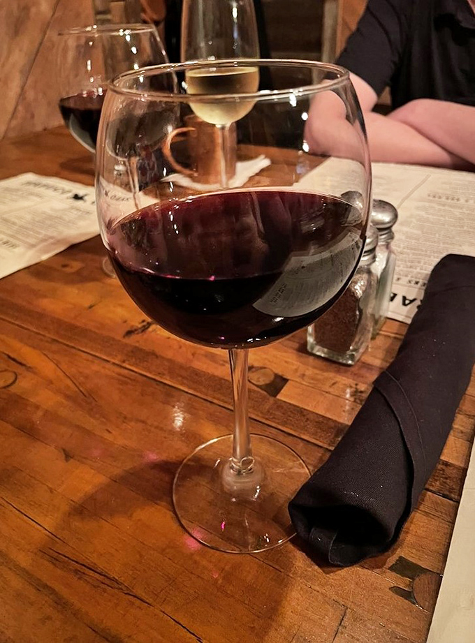 A glass of California red, waiting patiently to complement your steak. Wine and beef&mdash;a romance as old as time.