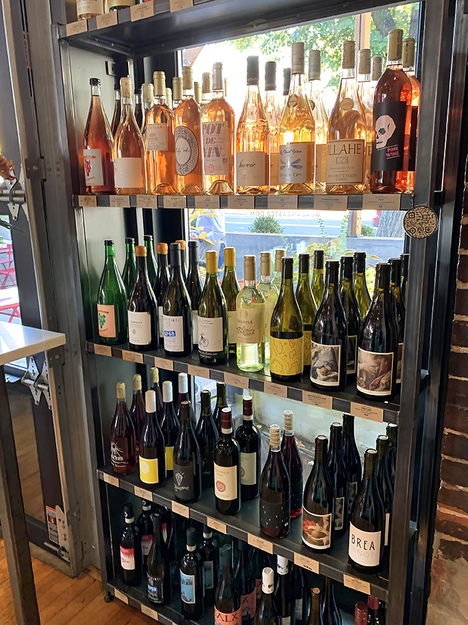 Their wine display isn't just storage&mdash;it's a gallery exhibition of Italian viniculture, with bottles arranged like colorful soldiers ready for delicious duty.