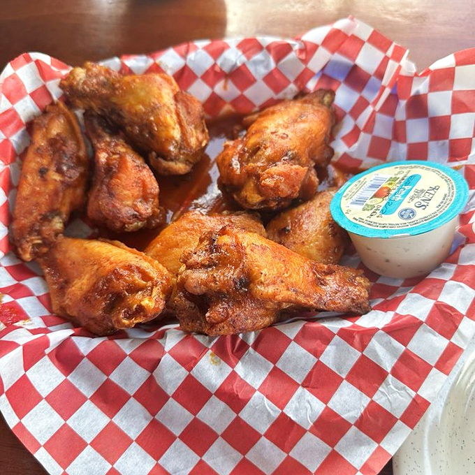 Wings that have clearly graduated from the School of Perfect Crispiness, served with a side of "you're definitely going to need more napkins."