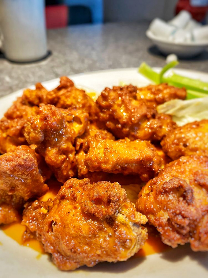 These wings aren't messing around&mdash;they're the kind that make you involuntarily close your eyes with each bite. Napkins: mandatory. Regrets: none.