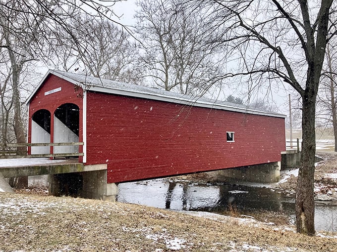 Winter transforms Roberts Bridge into a holiday card come to life, the dusting of snow highlighting every architectural detail against the stark landscape.