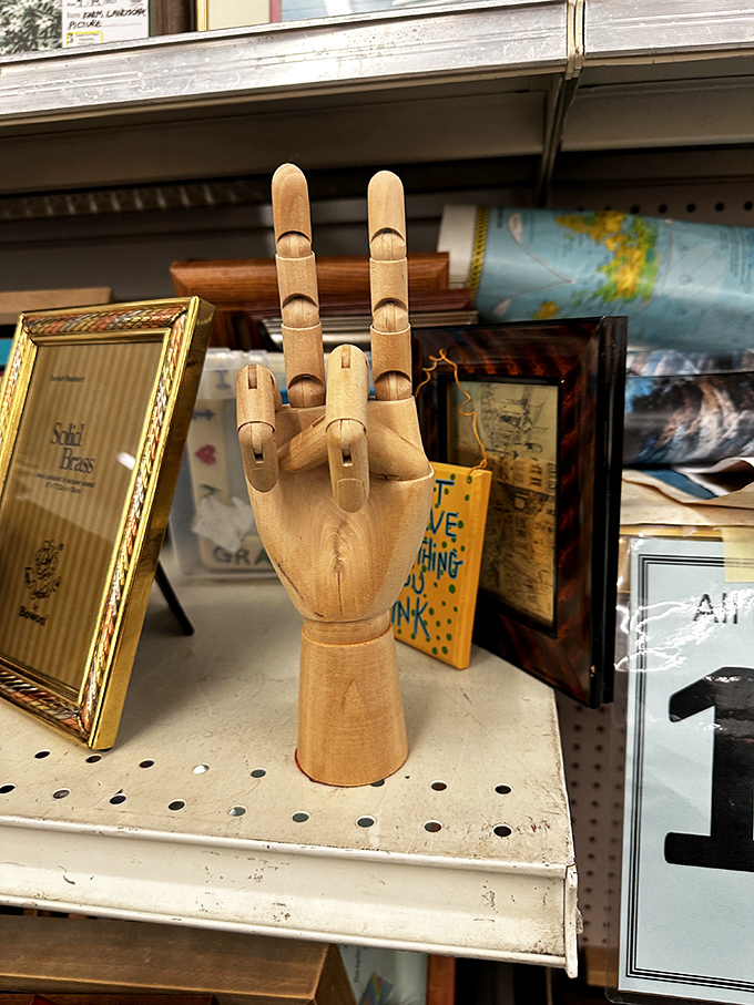 "Talk to the hand" takes on artistic meaning with this wooden mannequin. Perfect for artists or anyone needing a permanent high-five.