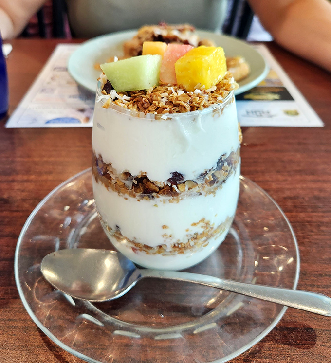 Layers of yogurt, granola, and fresh fruit create a breakfast parfait that's both virtuous and decadent. Spoon optional, smile guaranteed.