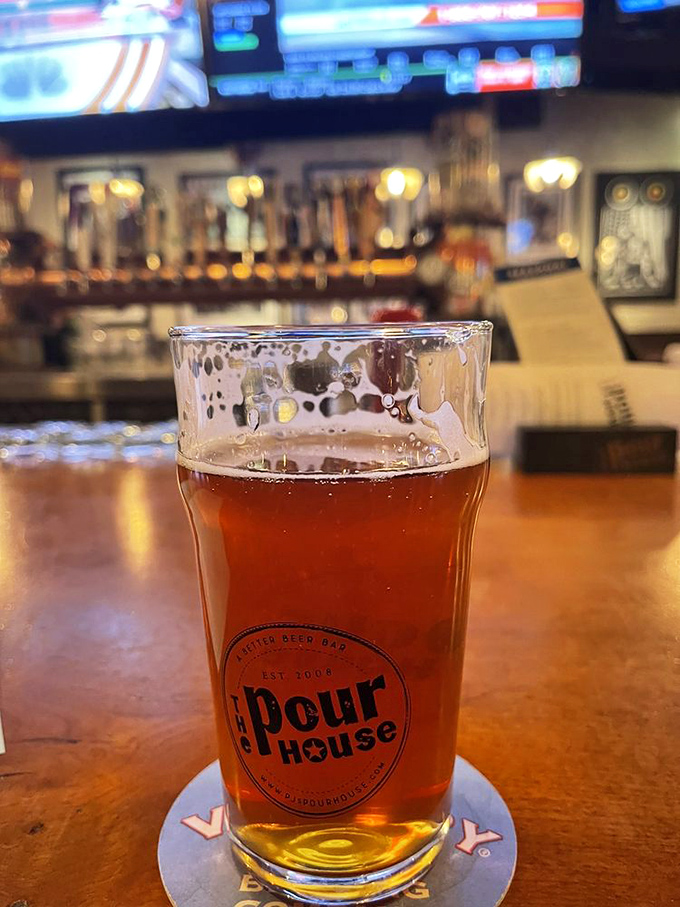 In this glass: liquid amber perfection, sporting The Pour House logo and containing approximately 16 ounces of pure, hoppy happiness.