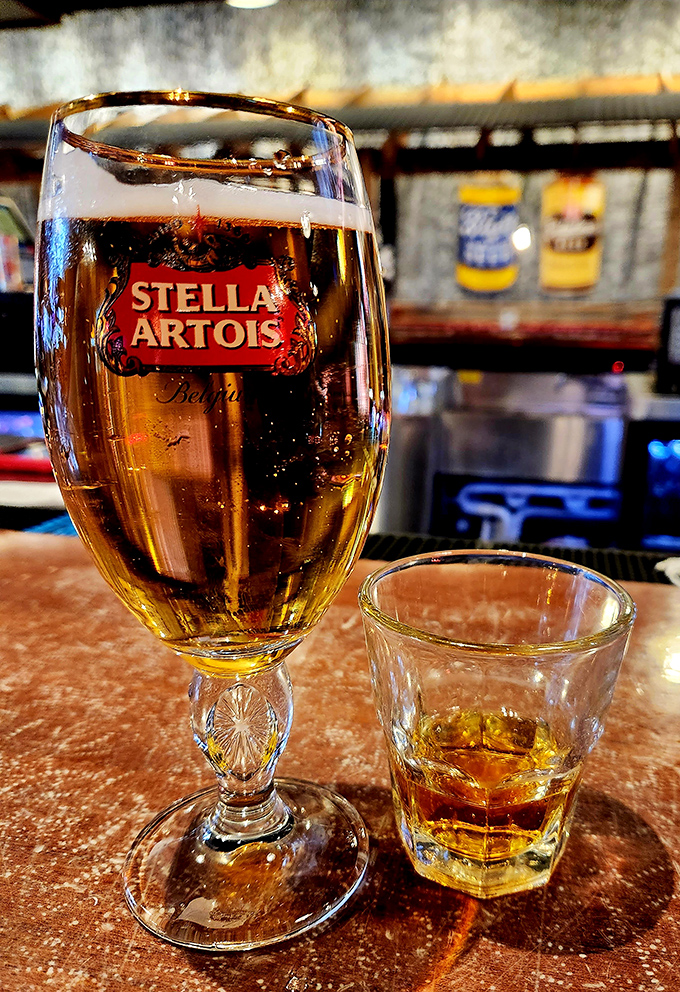 A perfect pour of Stella alongside a whiskey chaser &ndash; because sometimes adulting means having your cake and drinking it too.