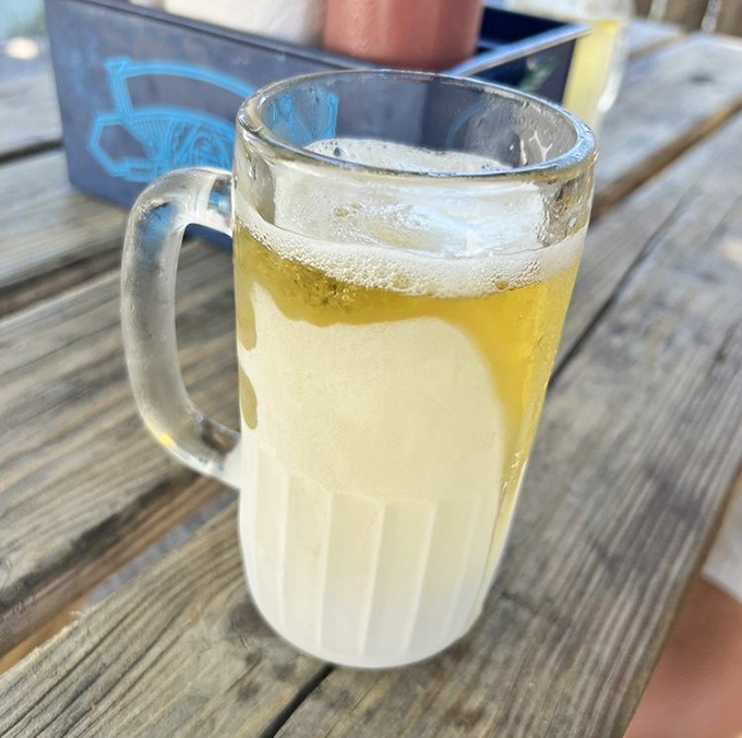 A frosty mug of beer that whispers, "Relax, friend. The emails can wait. The spreadsheets will survive without you."