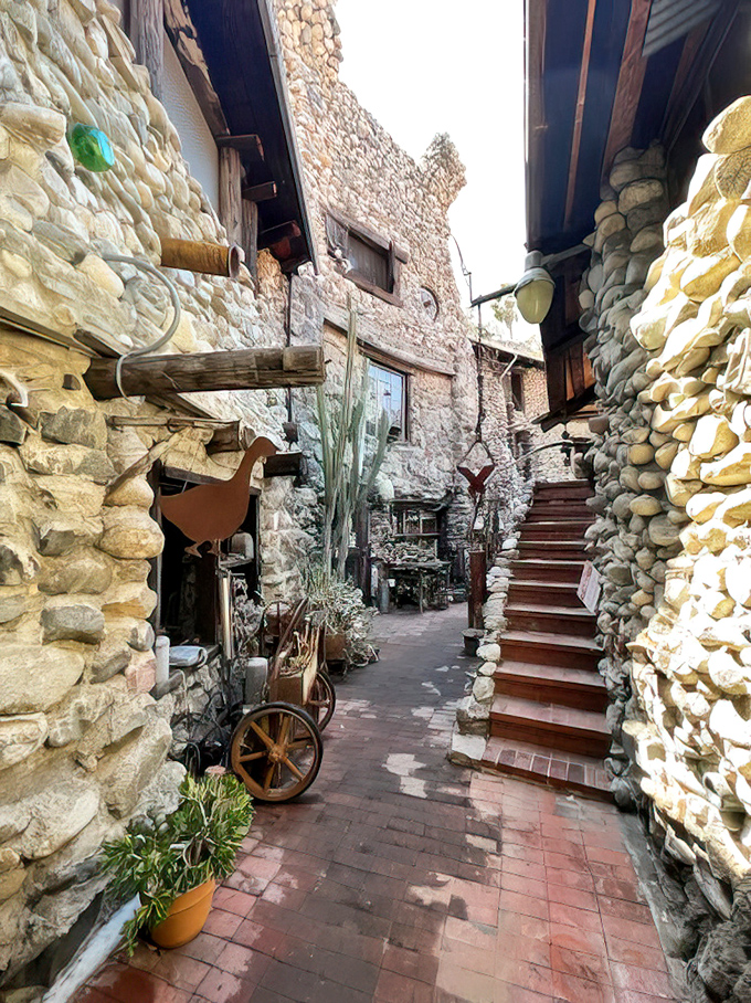 Narrow passages between stone walls create an intimate medieval village vibe. You half-expect to see a blacksmith hammering away around the corner.