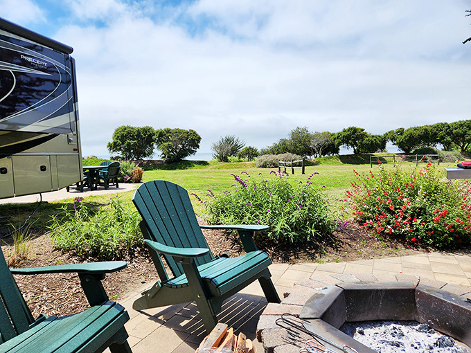 Adirondack chairs surrounding a fire pit&mdash;where stories get better, marshmallows get toasted, and worries get smaller.