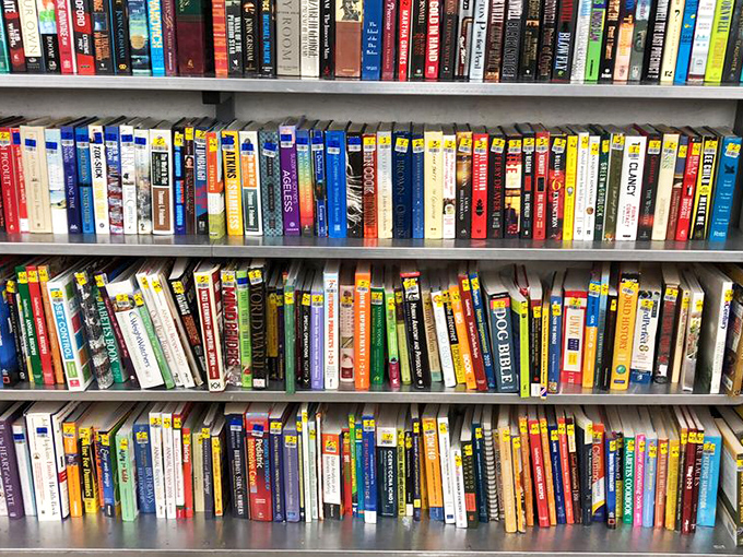 A library where every spine tells two stories: the one inside the book and the journey that brought it here.