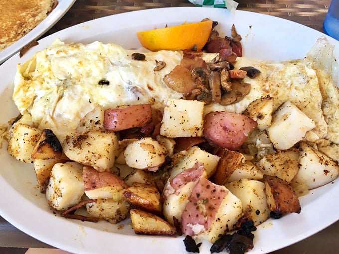 Potatoes roasted to crispy-outside, tender-inside perfection alongside eggs &ndash; proof that simple ingredients become extraordinary in the right hands.