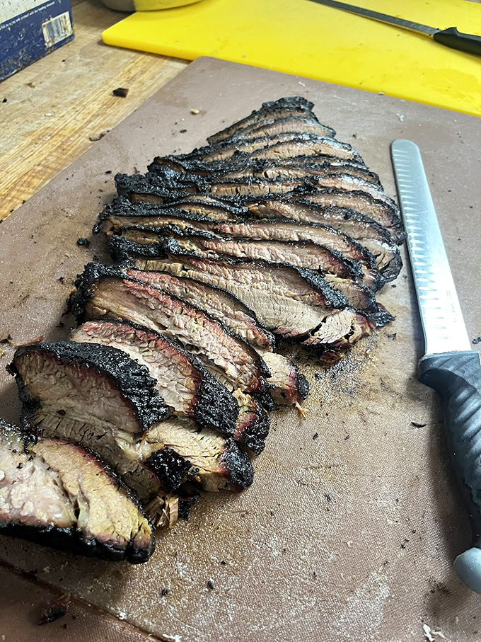 Brisket sliced with surgical precision. That smoke ring isn't just pink&mdash;it's a halo signifying barbecue transcendence.