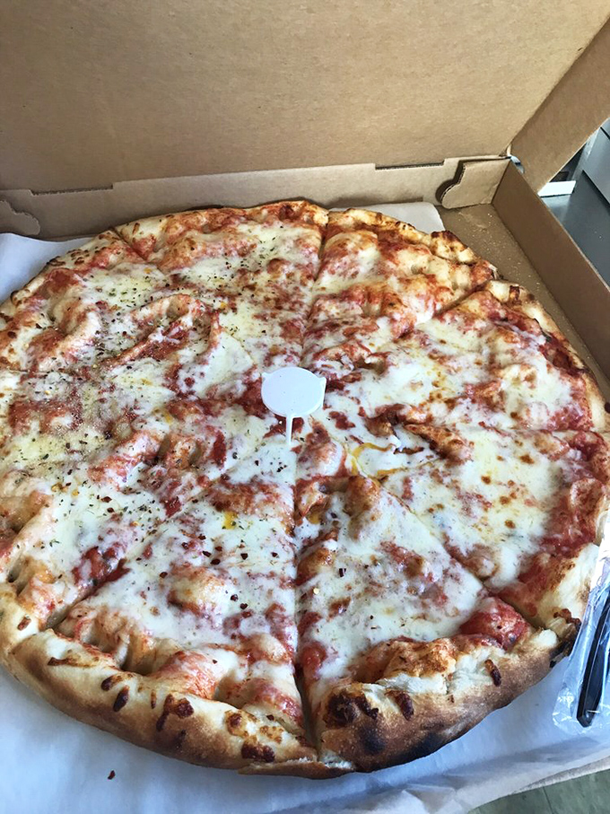 Sometimes simplicity is the ultimate sophistication. This classic cheese pizza proves you don't need fancy toppings when the basics are this good.