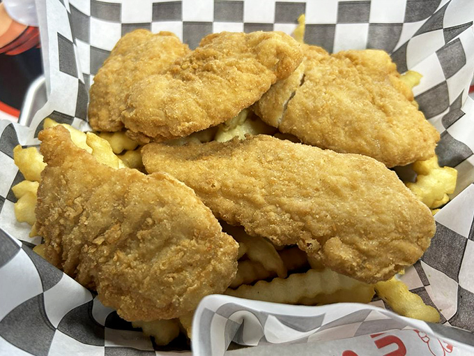 Golden-brown chicken tenders that would make Colonel Sanders question his life choices &ndash; crispy outside, tender inside, perfect everywhere.