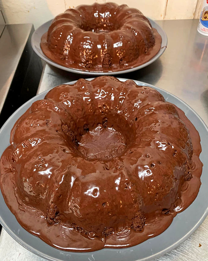 Chocolate bundt cakes glistening with glaze – the kind of dessert your diet plan specifically warned you about.