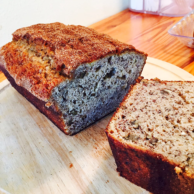 Banana bread elevated to art form&mdash;moist, cinnamon-speckled, and sliced to reveal its tender crumb interior.