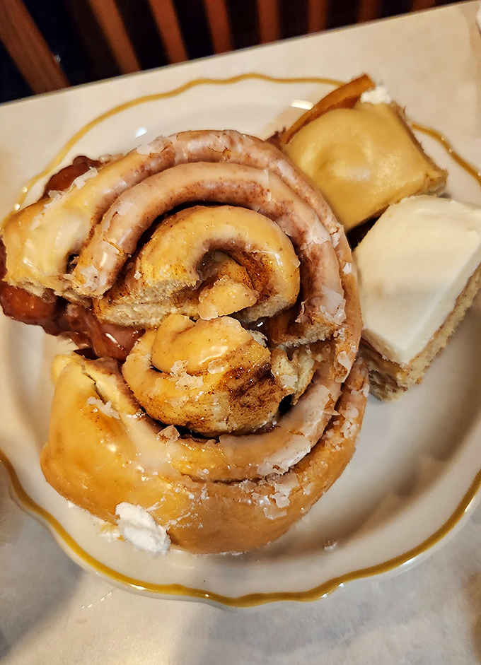 Cinnamon rolls that spiral into sweet perfection, demanding immediate attention and zero sharing with tablemates.
