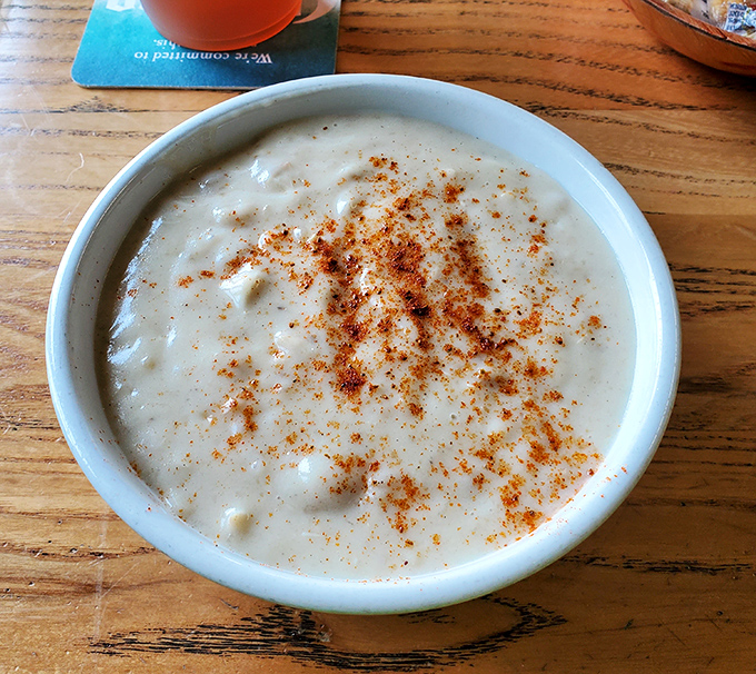 A bowl of creamy clam chowder dusted with spice&mdash;comfort food that tastes like the ocean and feels like a warm hug on a cool day.