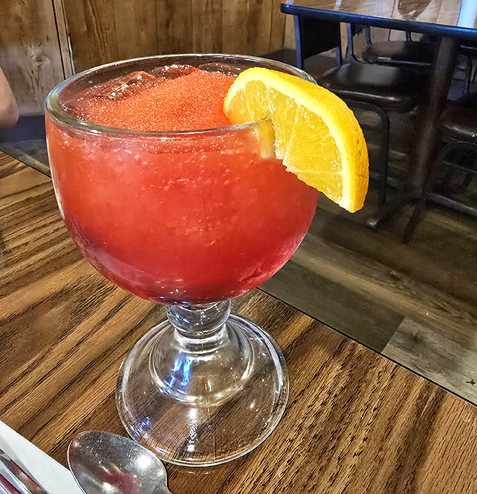 A vibrant cocktail that says "vacation mode activated" even if you're just playing hooky from work on a random Tuesday.