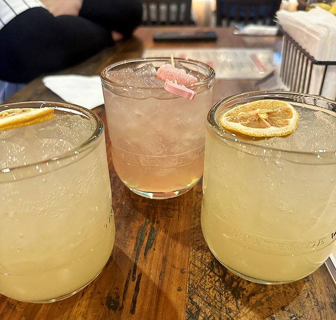 These aren't just drinks; they're liquid sunshine in mason jars, garnished with citrus wheels that brighten even the cloudiest Pennsylvania day.