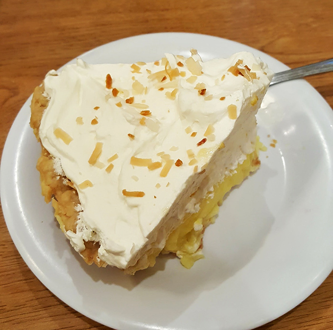 Coconut cream pie topped with toasted coconut flakes that make you wonder why you ever waste calories on lesser desserts.