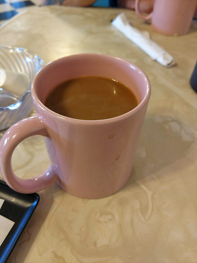 Sometimes the simple pleasure of perfectly brewed coffee in a classic mug makes everything feel right.