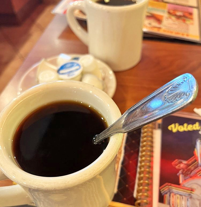 The humble diner coffee mug&mdash;steadfast companion to countless conversations, confessions, and "just one more slice" negotiations.