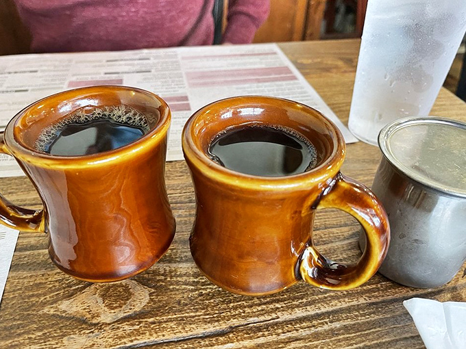 These aren't just coffee mugs; they're ceramic vessels of liquid motivation, sturdy enough to survive the apocalypse or Monday mornings.