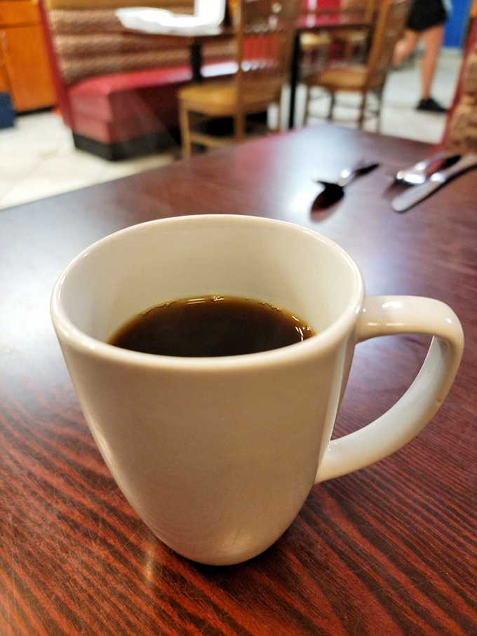 Simple black coffee in a white mug&mdash;the unsung hero of every great breakfast experience and the fuel for all meaningful morning conversations.