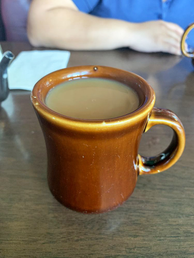 That amber-colored coffee in a classic diner mug tastes like liquid motivation and pure happiness.